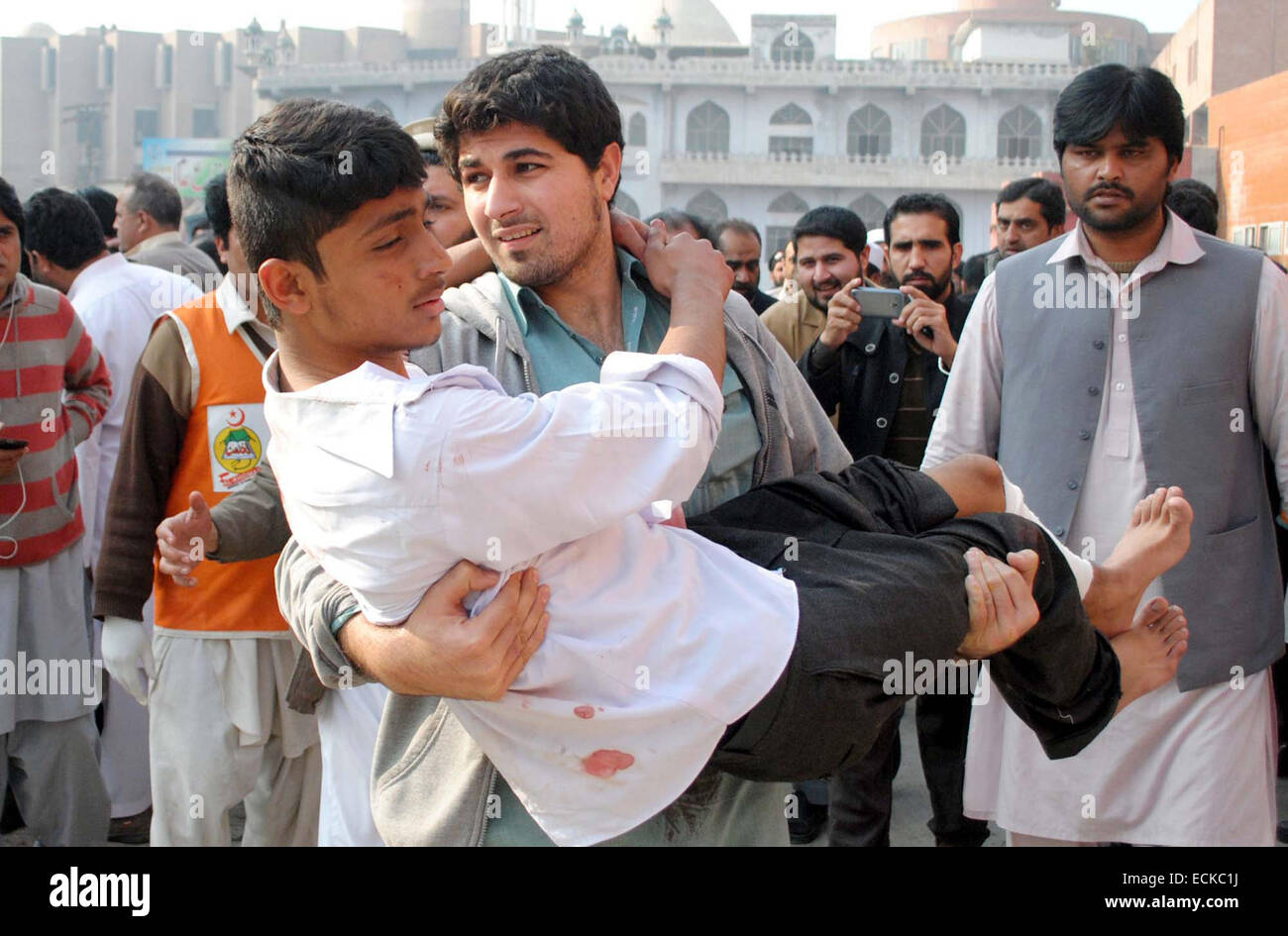 Peshawar, Pakistan. 16th Dec, 2014. Victims of militants attacked an ...