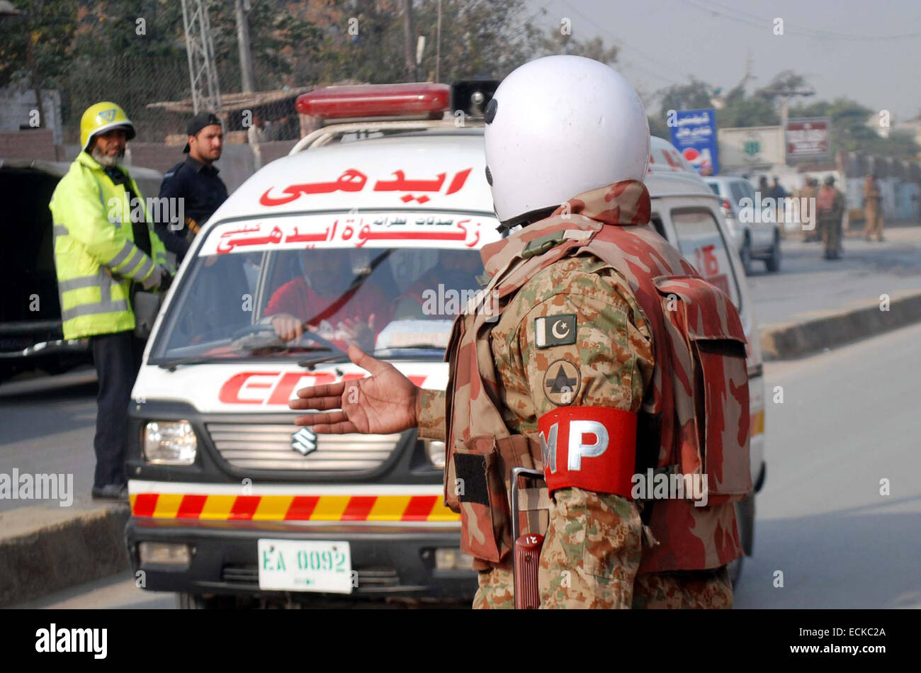 Peshawar, Pakistan. 16th Dec, 2014. Security personnel cordon off venue ...