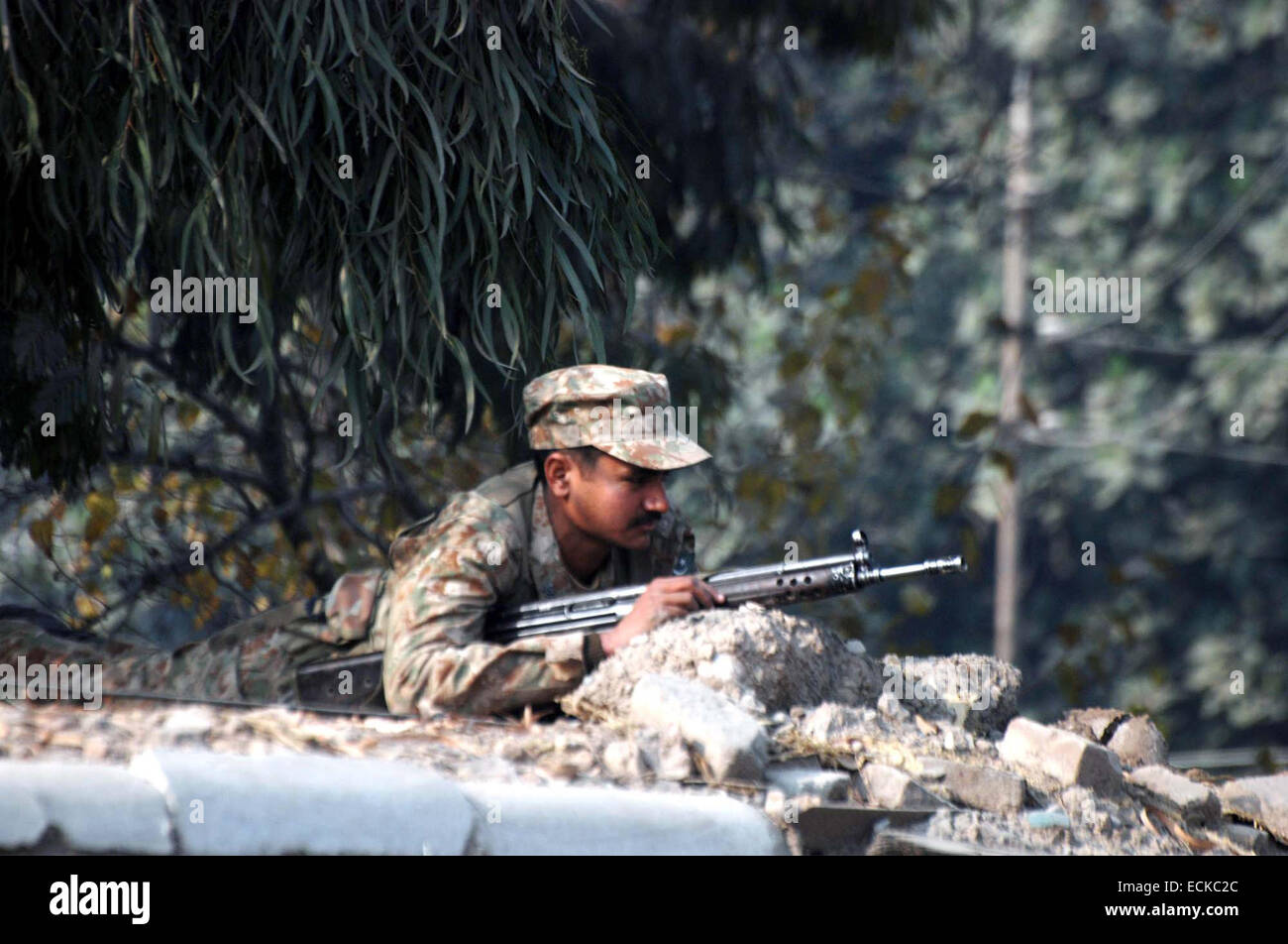 Peshawar, Pakistan. 16th Dec, 2014. Security personnel cordon off venue ...