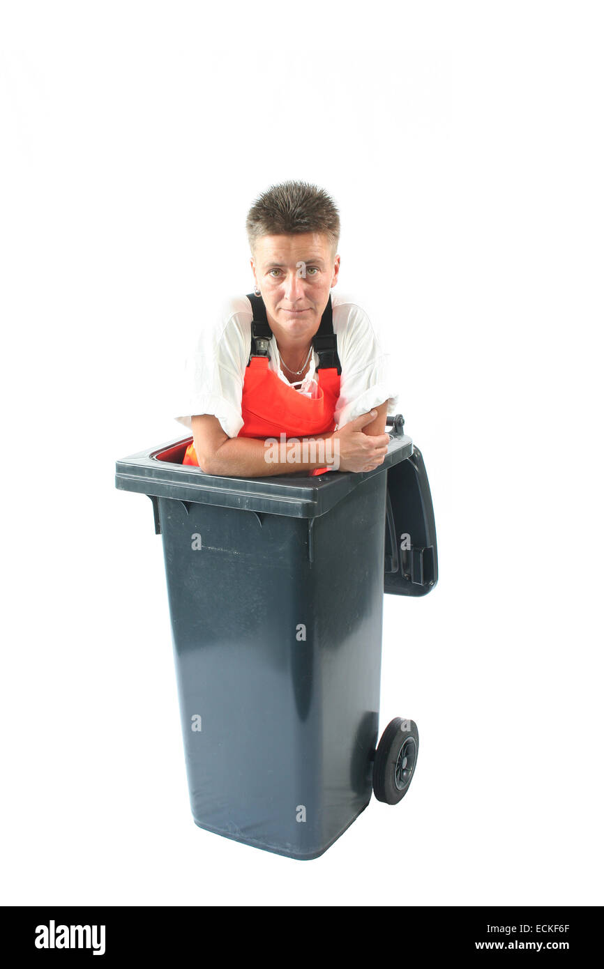 young woman in a garbage can on a white background Stock Photo - Alamy