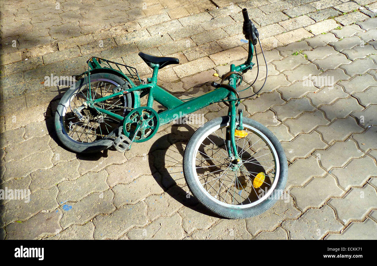 Retro children's bicycle on the ground Stock Photo - Alamy