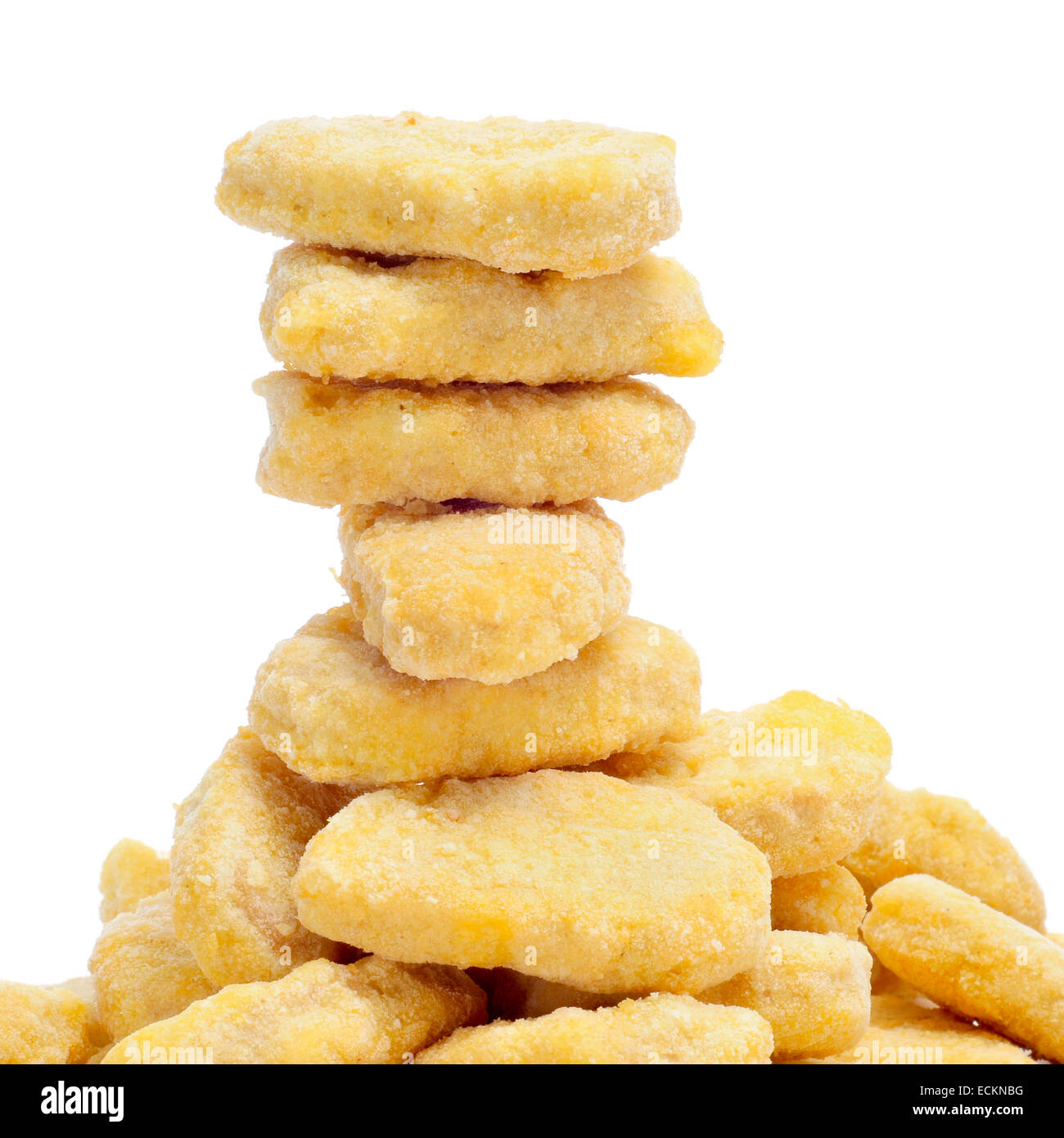 a pile of chicken nuggets on a white background Stock Photo - Alamy