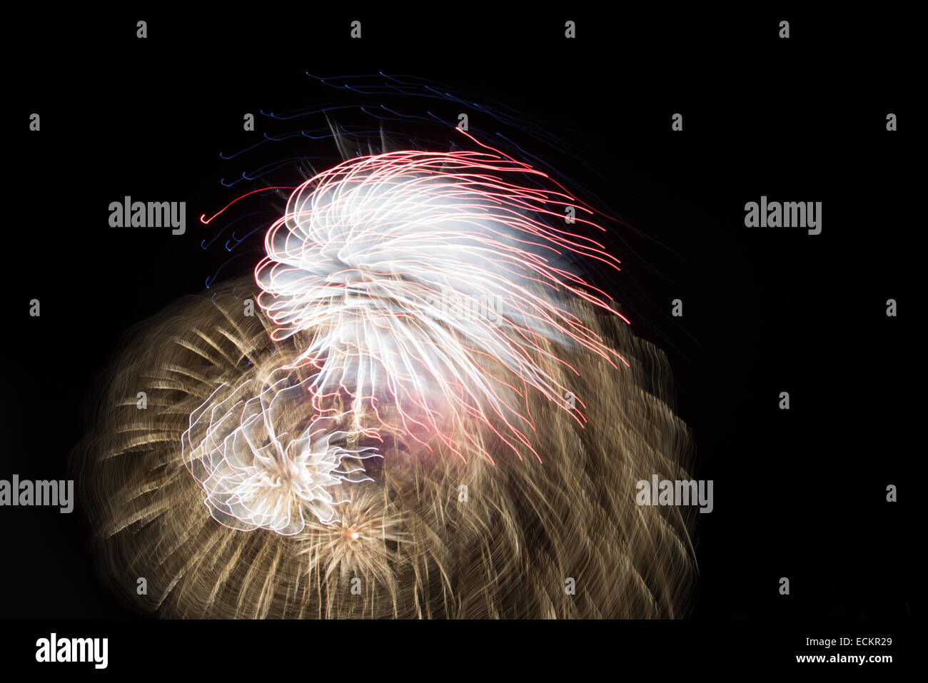 Firework display with blurred motion Stock Photo - Alamy