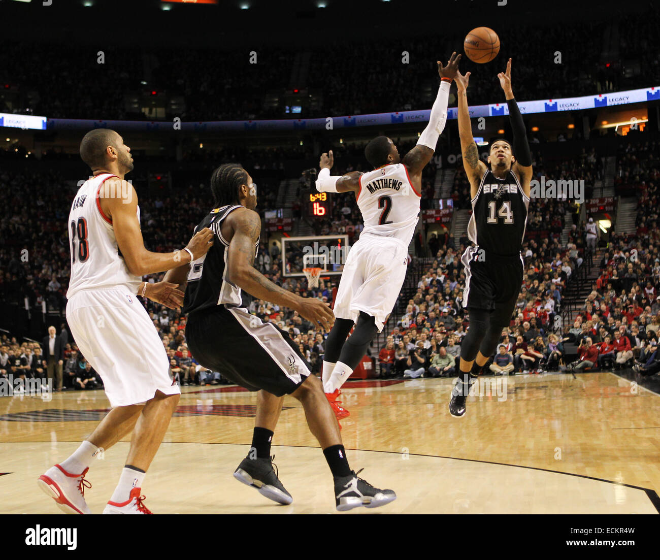 Portland, Oregon, USA. 15th Dec, 2014. WESLEY MATTHEWS (2) fights for a ...