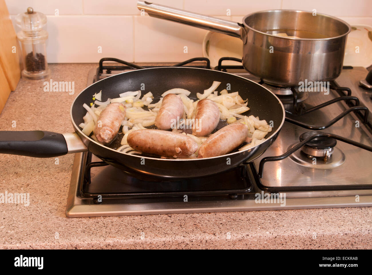 Cooking onions frying pan hi-res stock photography and images - Alamy