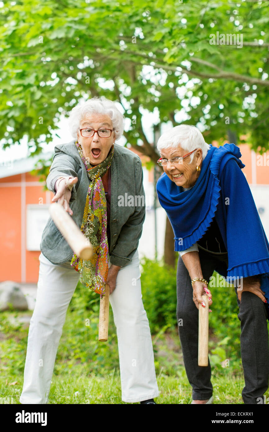 Excited senior people enjoying kubb game at park Stock Photo - Alamy