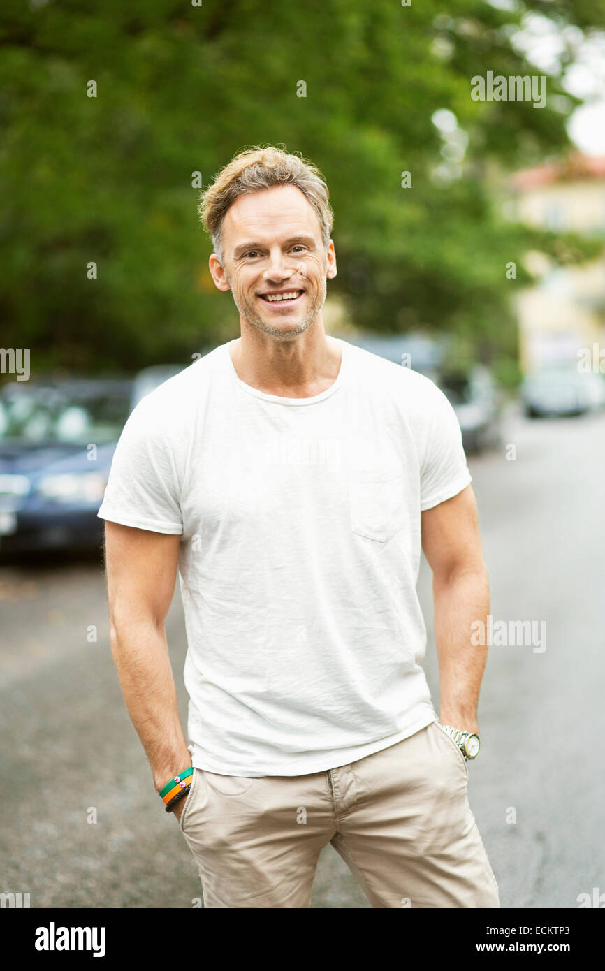 Portrait of happy man on street Stock Photo - Alamy