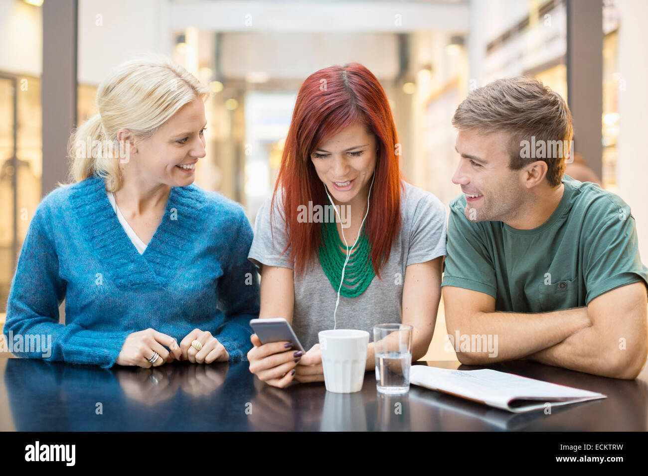 Friends talking to cellphones happy hi-res stock photography and images ...