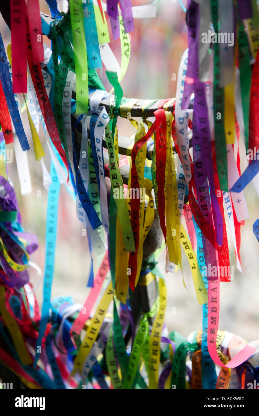 Colorful religious Brazilian wish ribbons Fita do Bonfim tied on church ...