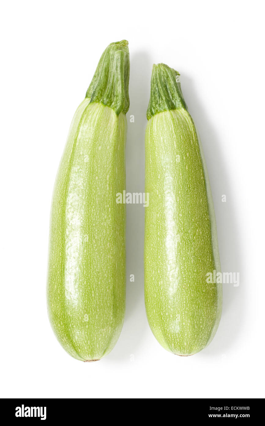 Two fresh zucchini isolated on white background Stock Photo - Alamy