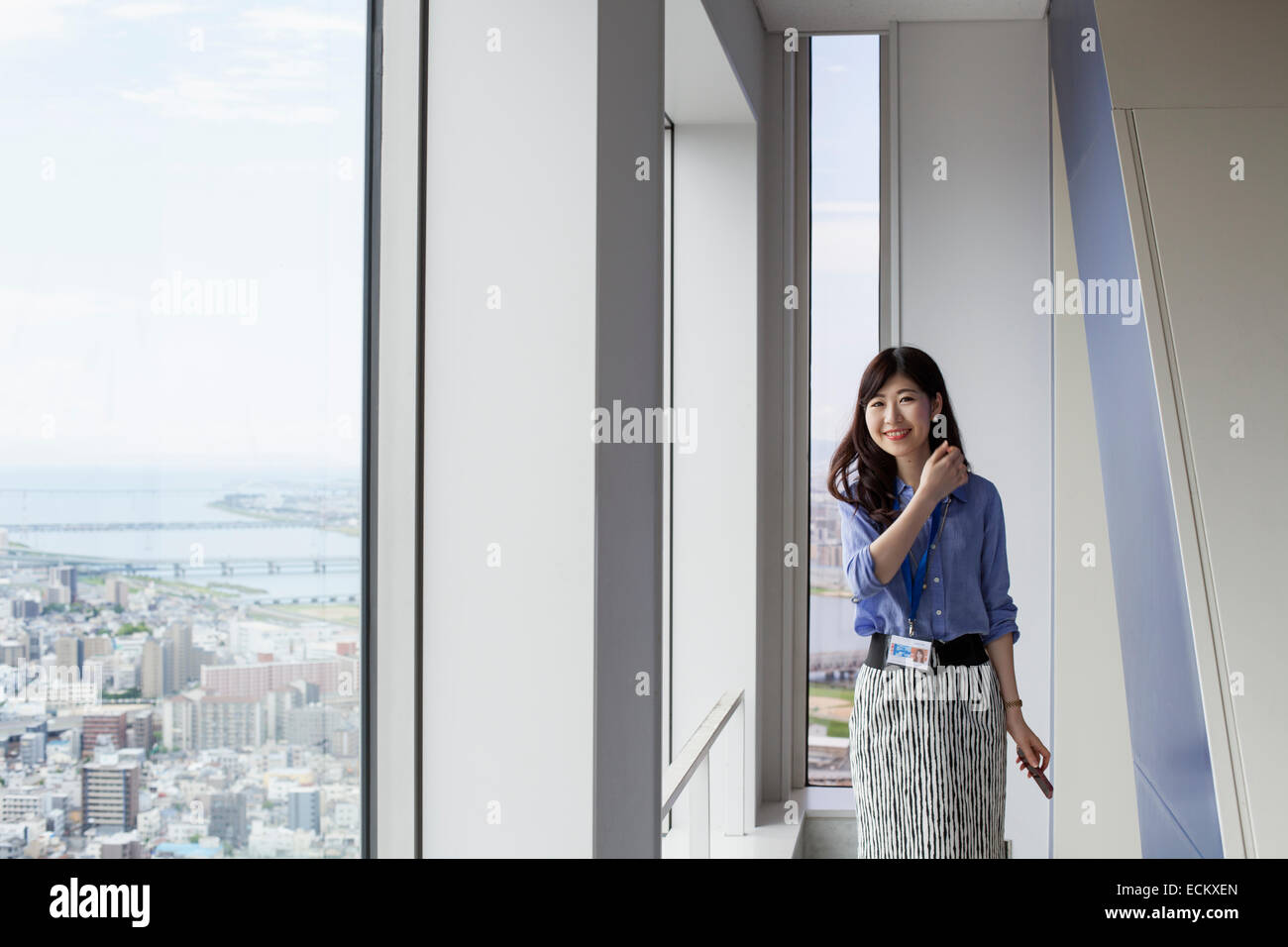 A working woman in an office building Stock Photo - Alamy