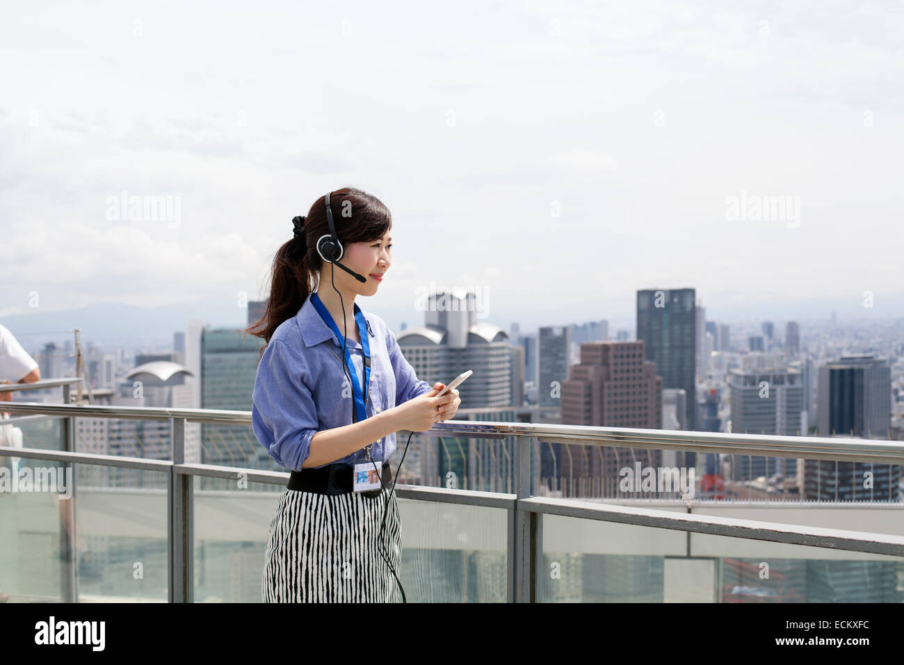 Person on balcony hi-res stock photography and images - Alamy
