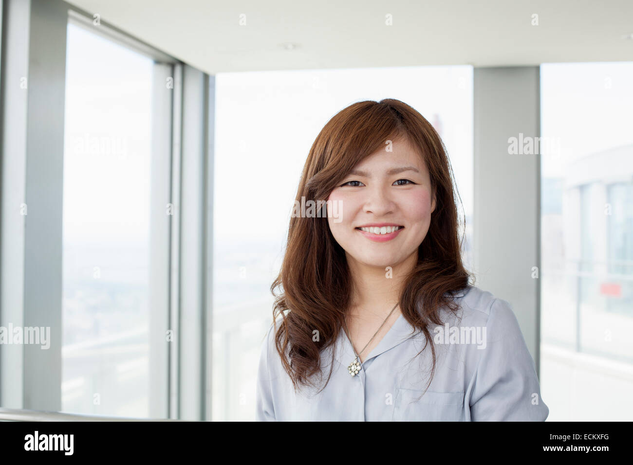 A working woman in an office building Stock Photo - Alamy
