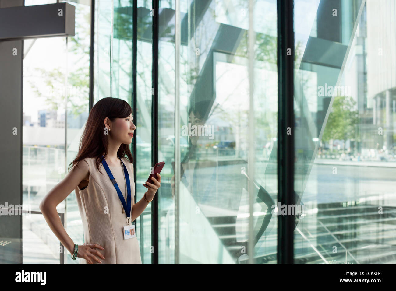 A working woman in an office building Stock Photo - Alamy