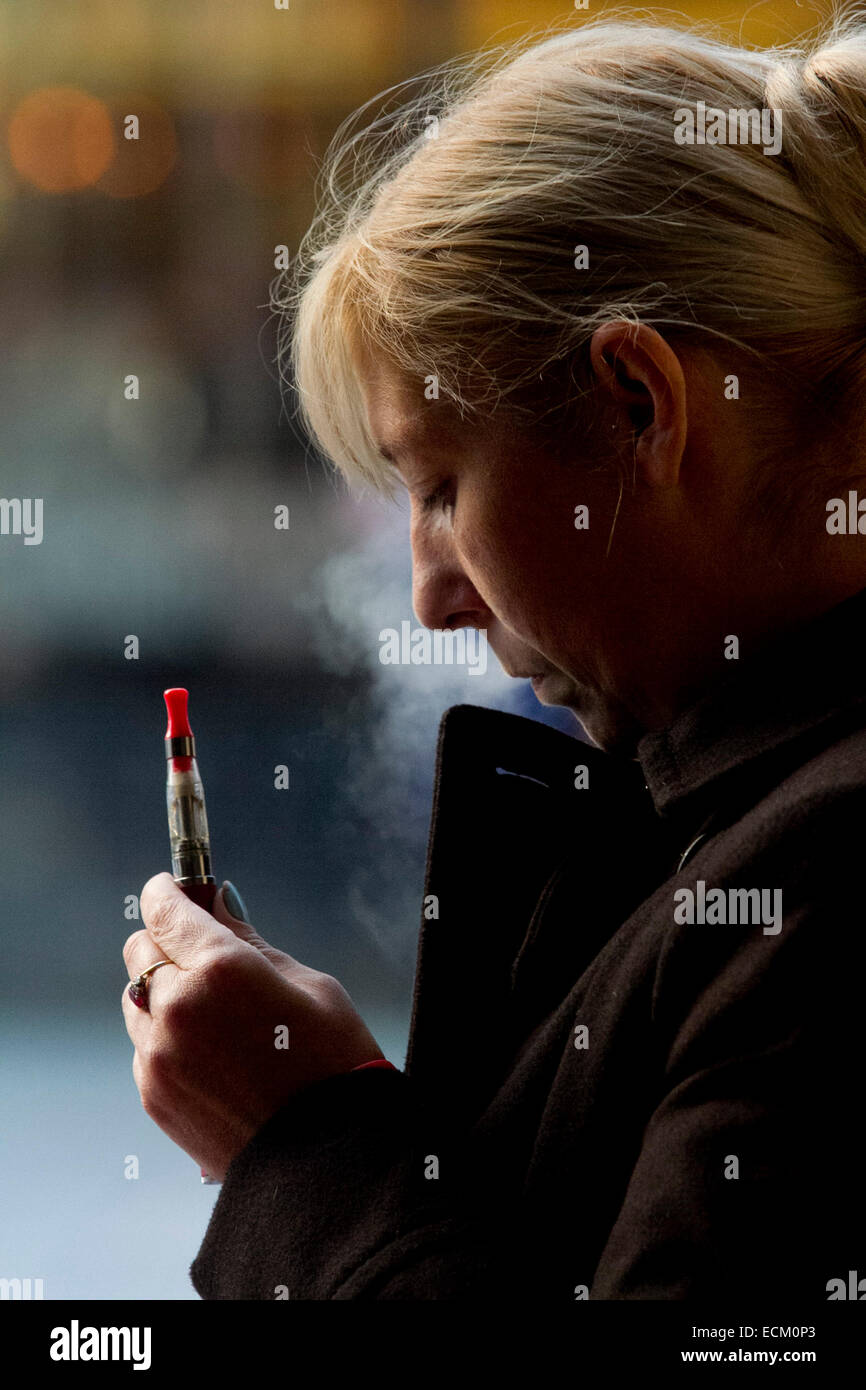 Smoking cigarette break office woman hi-res stock photography and ...