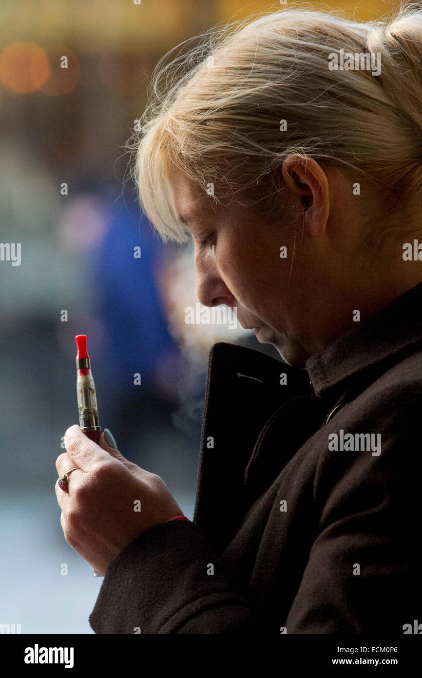 Smoking cigarette break office woman hi-res stock photography and ...