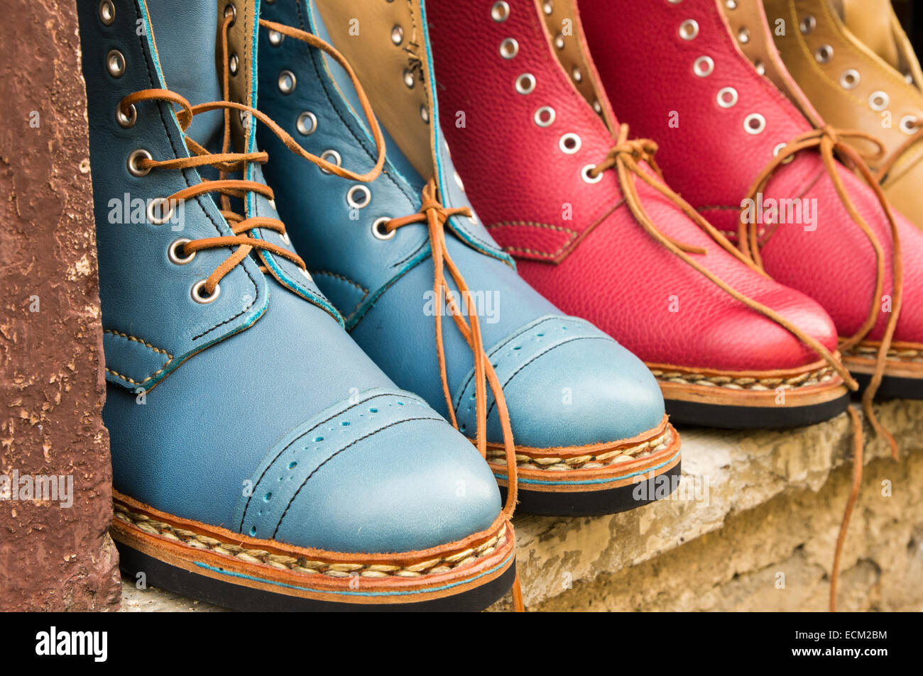 Leather boots colored fabrics have been Stock Photo - Alamy
