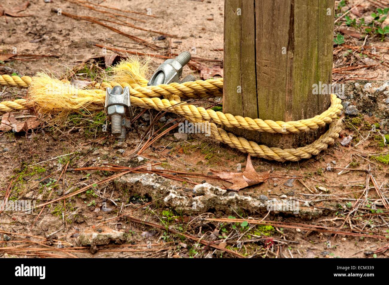A weathered rope still keeps the boats from floating off Stock Photo ...