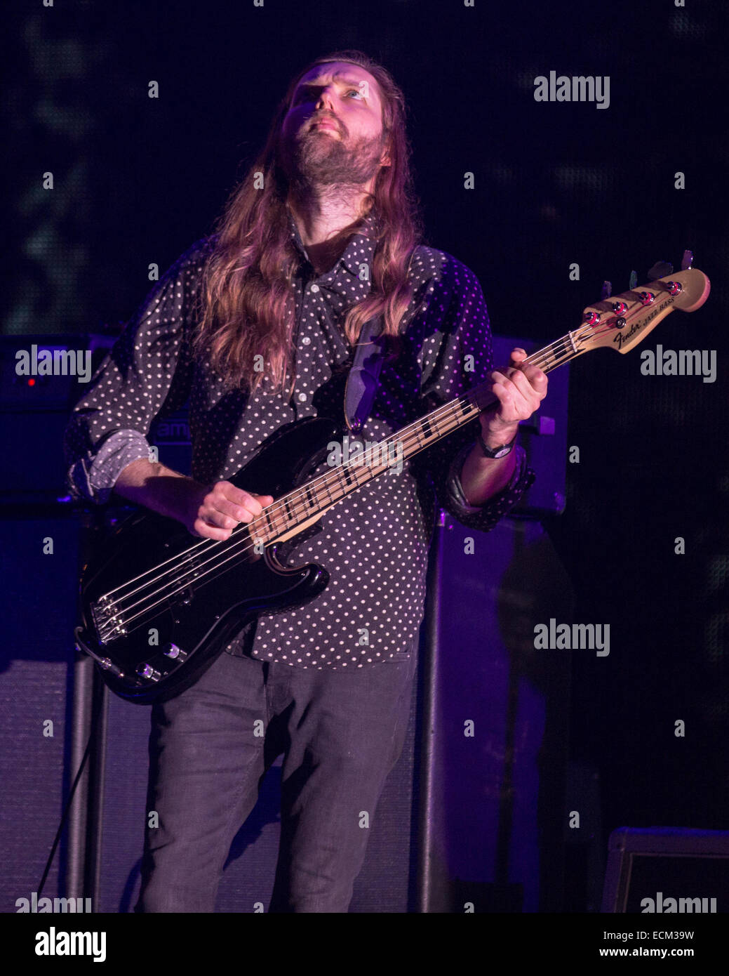 Inglewood, California, USA. 13th Dec, 2014. Bassist MARK STOERMER of The Killers performs live ...