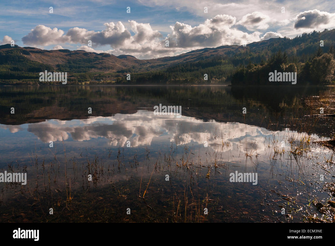 A landscape view of Loch Maree looking towards Garbhaig house with mist ...