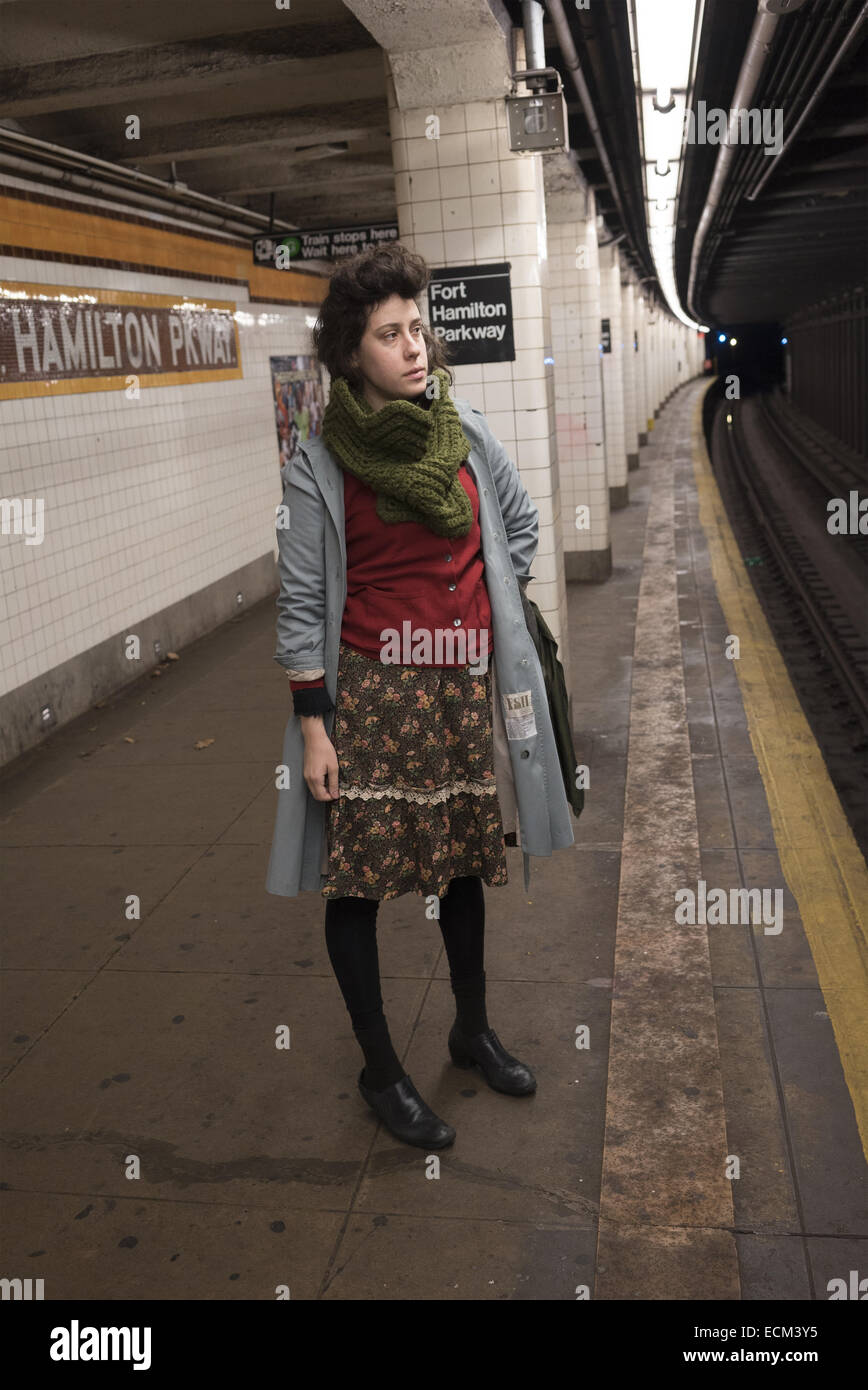 Woman alone subway station hi-res stock photography and images - Alamy