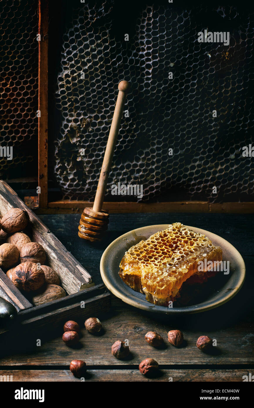 Fresh honeycomb with mix of nuts hi-res stock photography and images ...