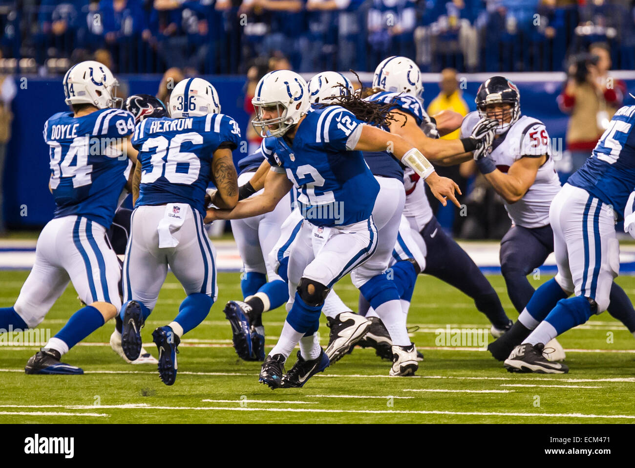 Indianapolis Colts quarterback Andrew Luck (12) hands the ball off to ...