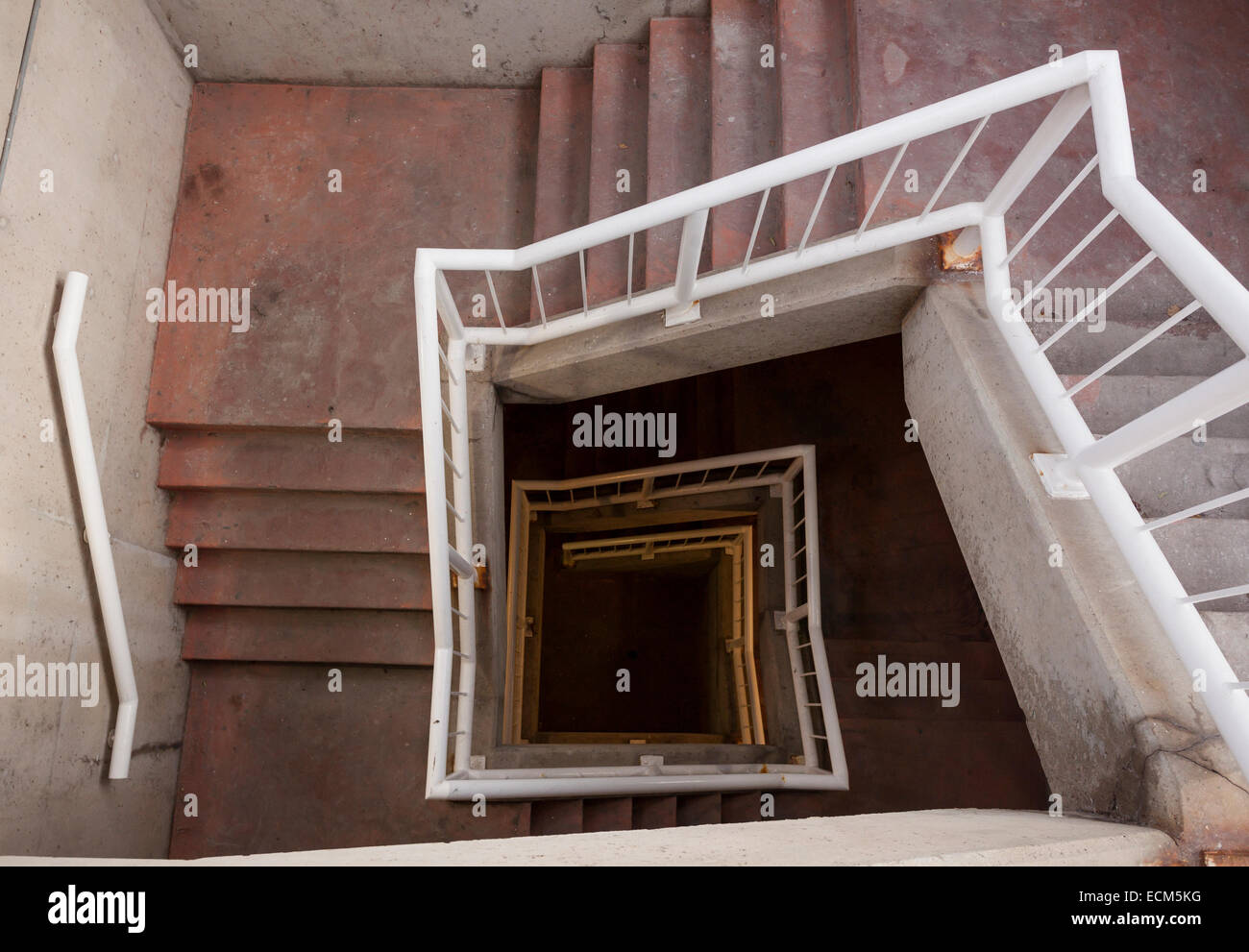 A unique view of a staircase looking down towards the bottom in ...