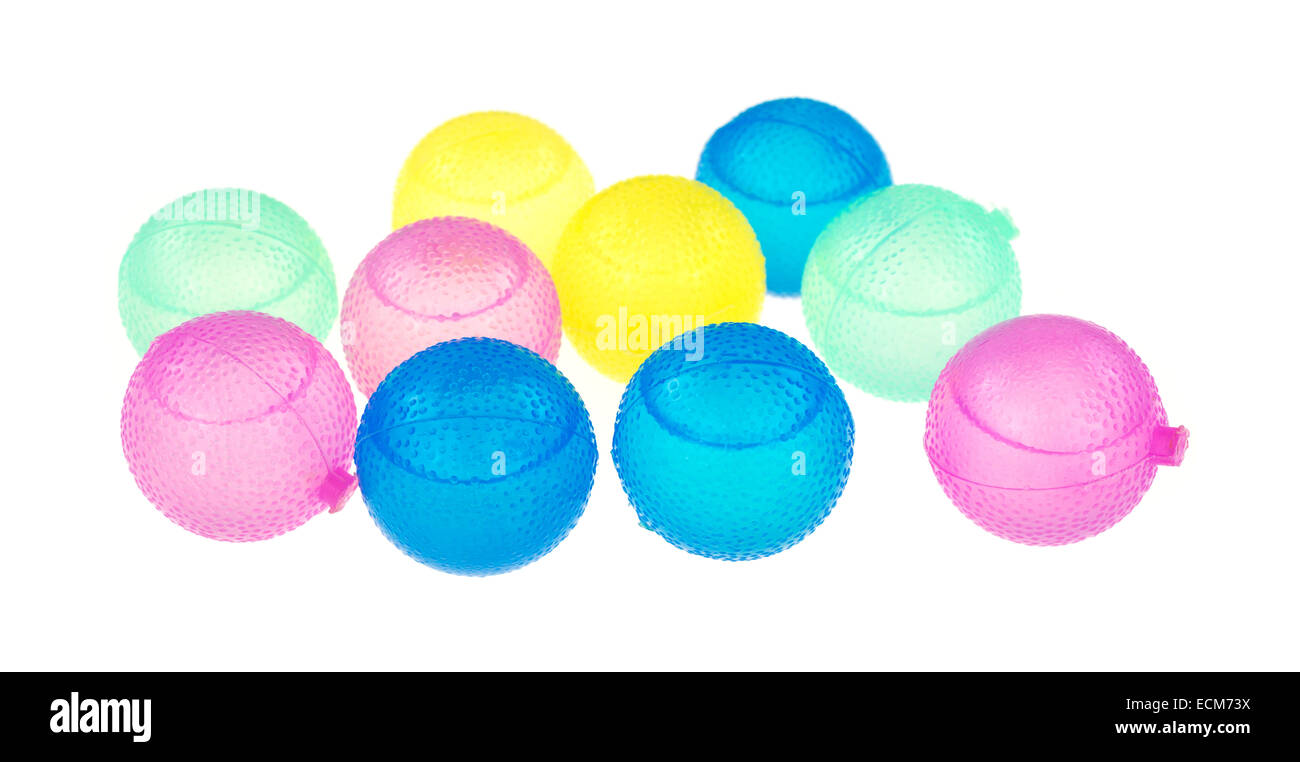 Several plastic ice cubes on a white background Stock Photo - Alamy