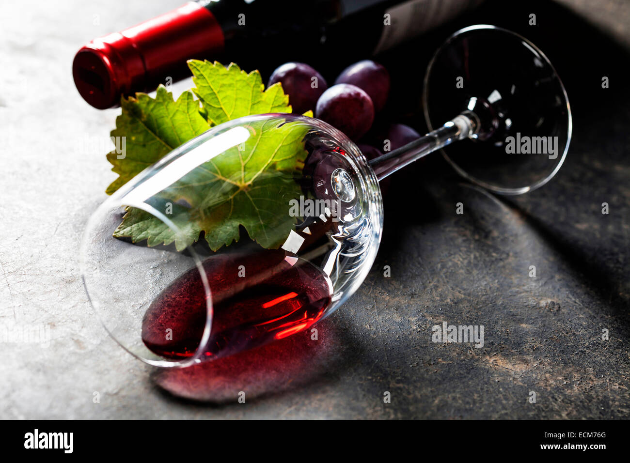 Glass of red wine on dark background Stock Photo - Alamy
