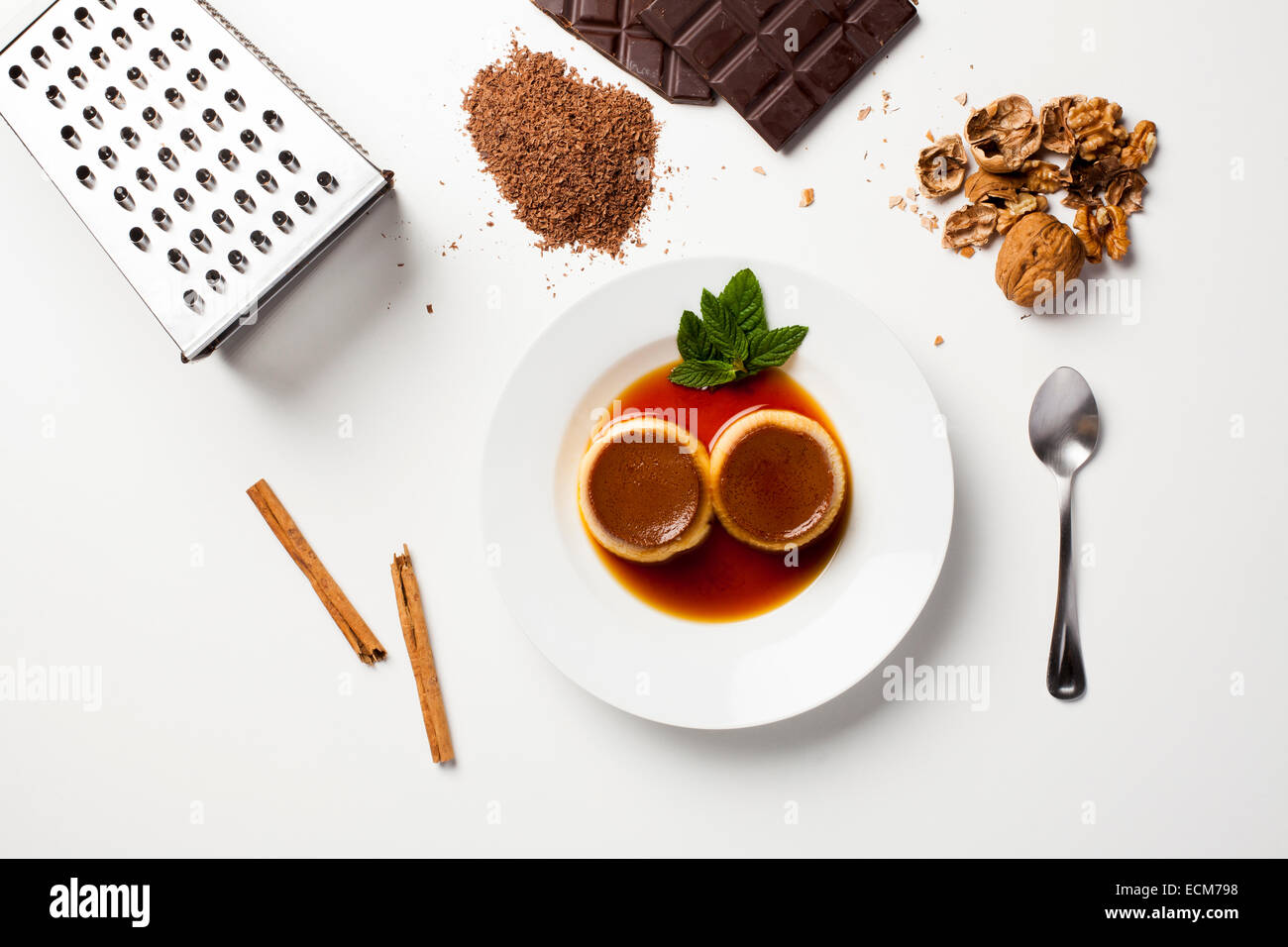 Two egg flan, chocolate and nuts Stock Photo - Alamy