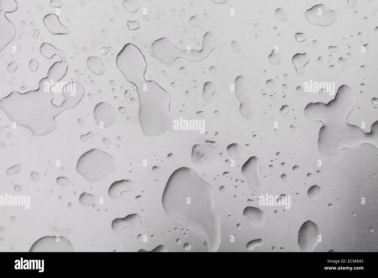 Metal surface covered in water drops bottom, closeup Stock Photo - Alamy
