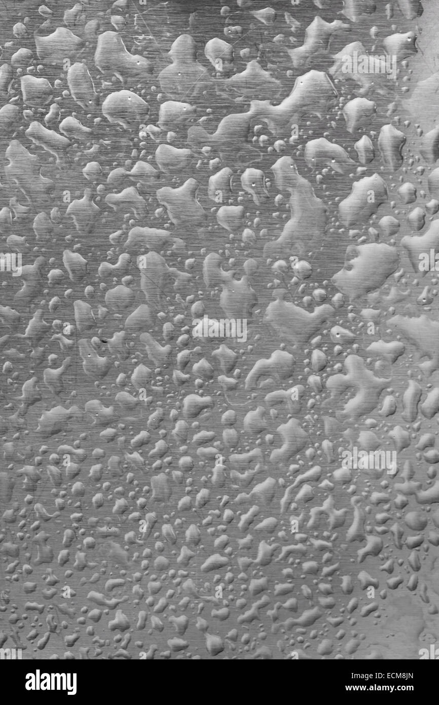 Metal surface covered in water drops bottom, closeup Stock Photo - Alamy