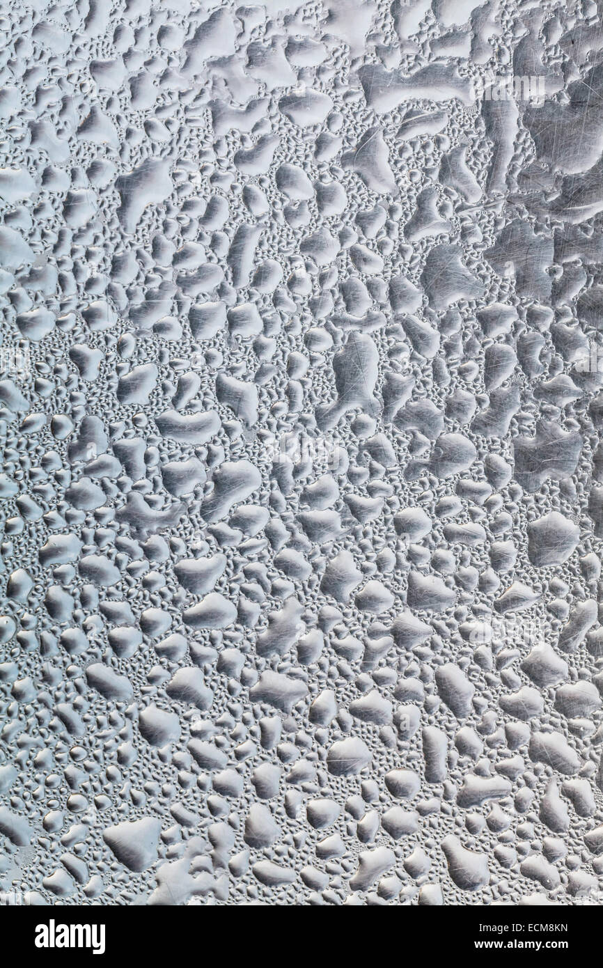 Metal surface covered in water drops bottom, closeup Stock Photo - Alamy