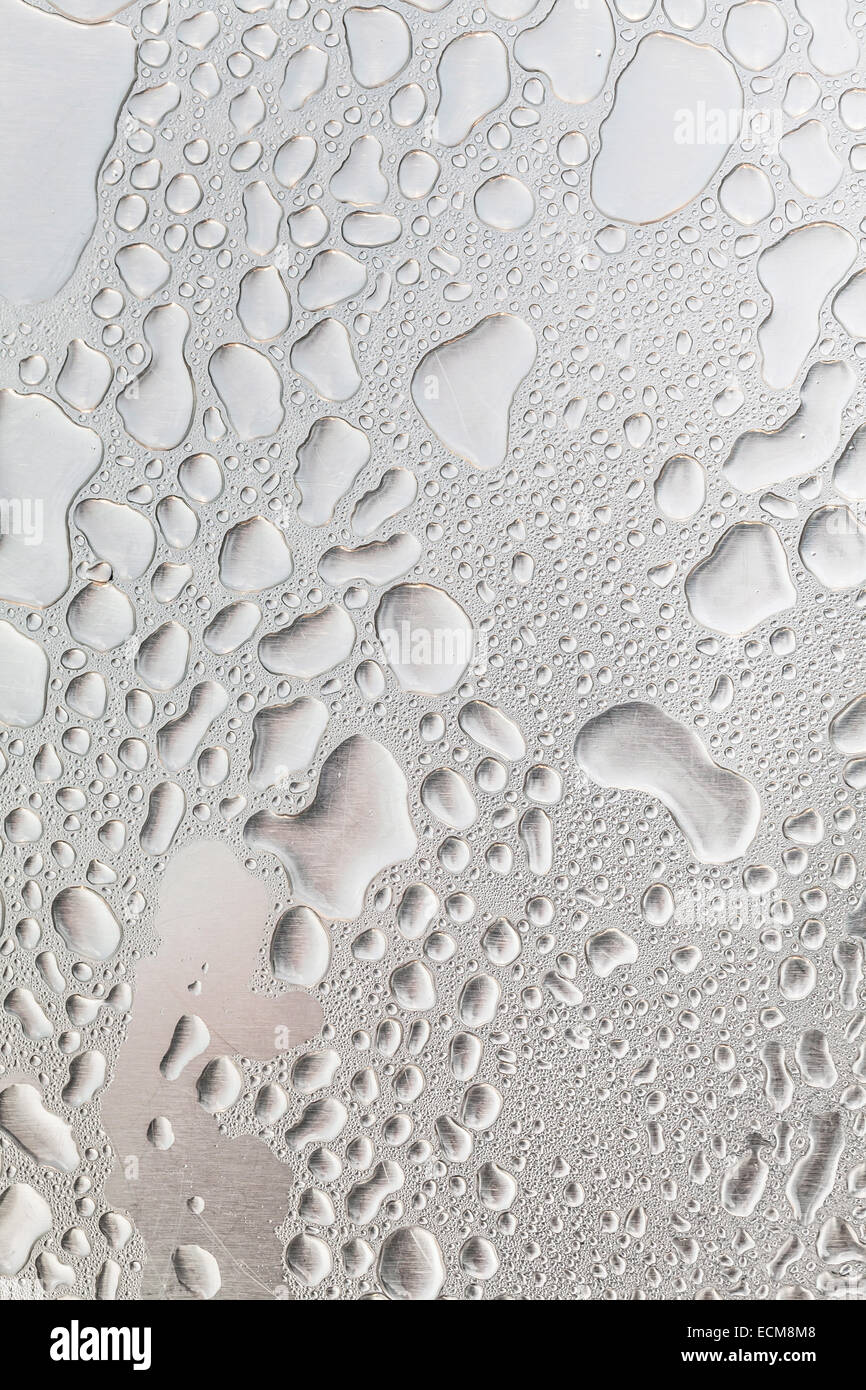Metal surface covered in water drops bottom, closeup Stock Photo - Alamy