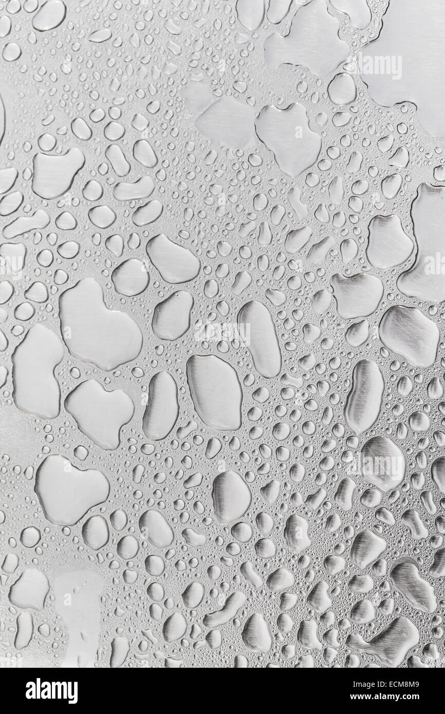 Metal surface covered in water drops bottom, closeup Stock Photo - Alamy