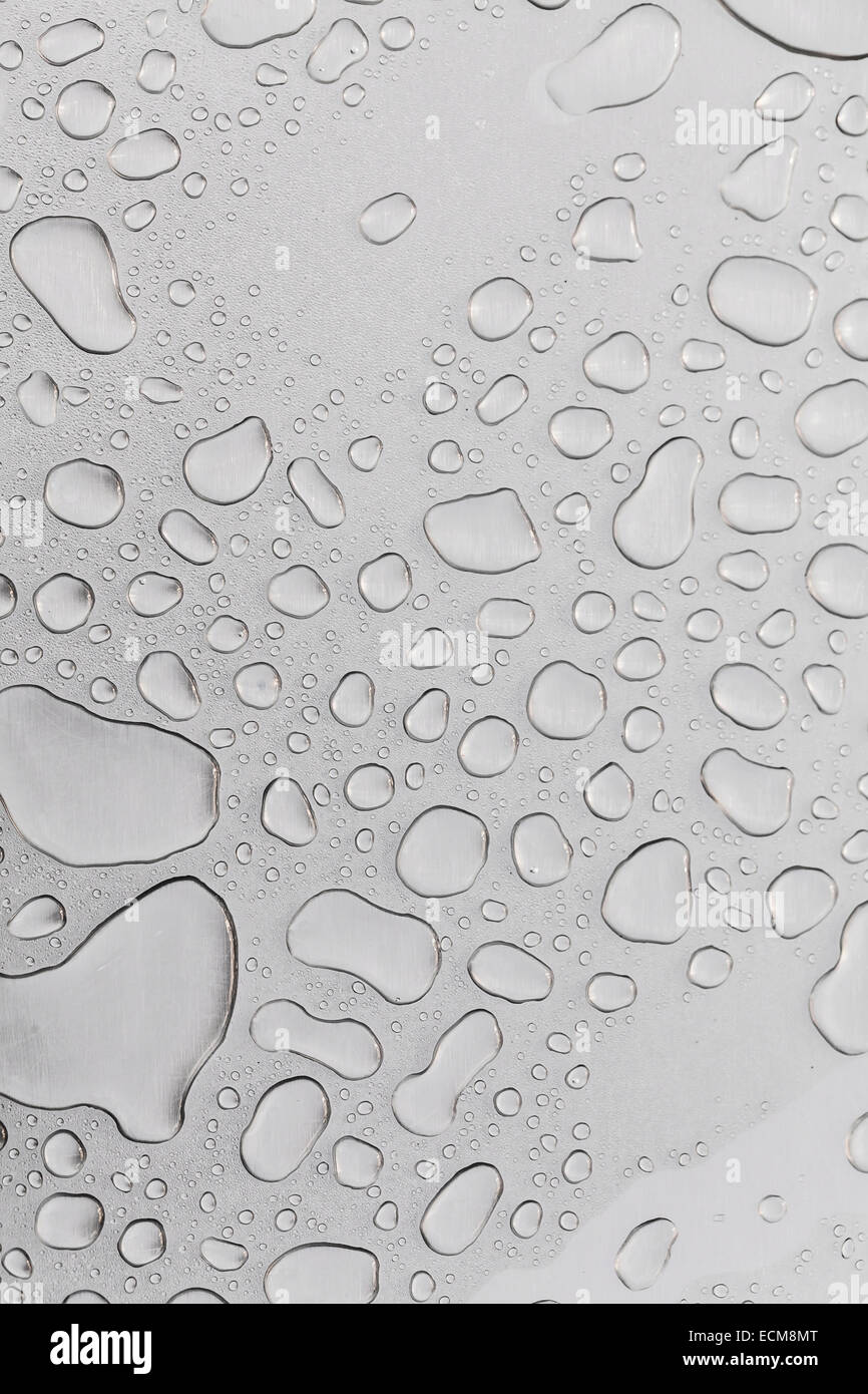 Metal surface covered in water drops bottom, closeup Stock Photo - Alamy