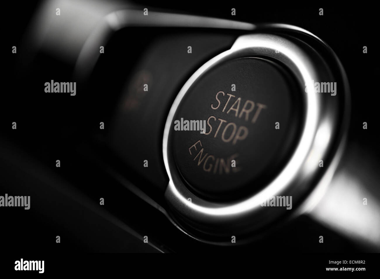 Detail on a black start button in a car Stock Photo - Alamy
