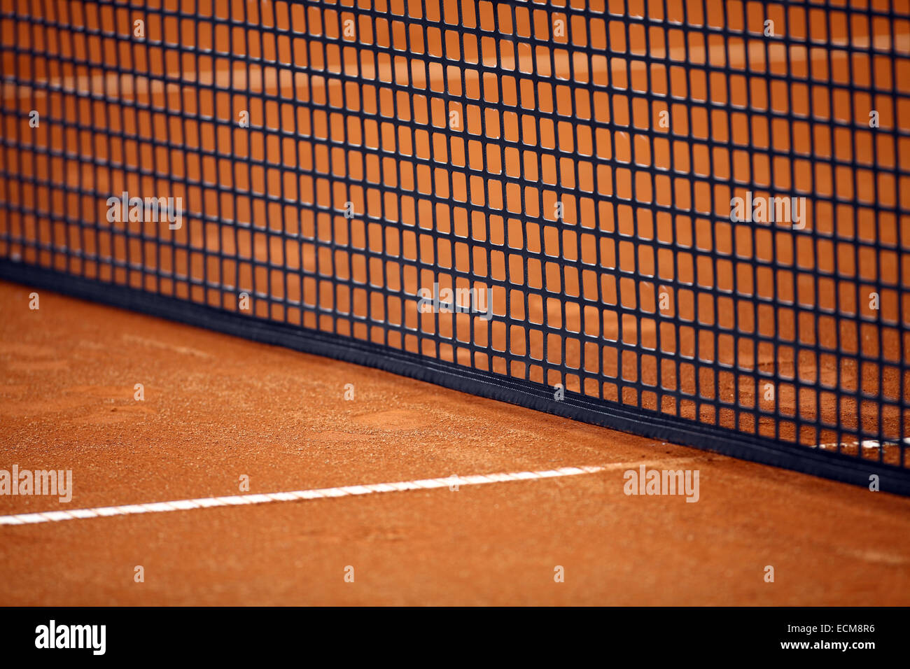 Detail of a tennis net on a clay court Stock Photo - Alamy