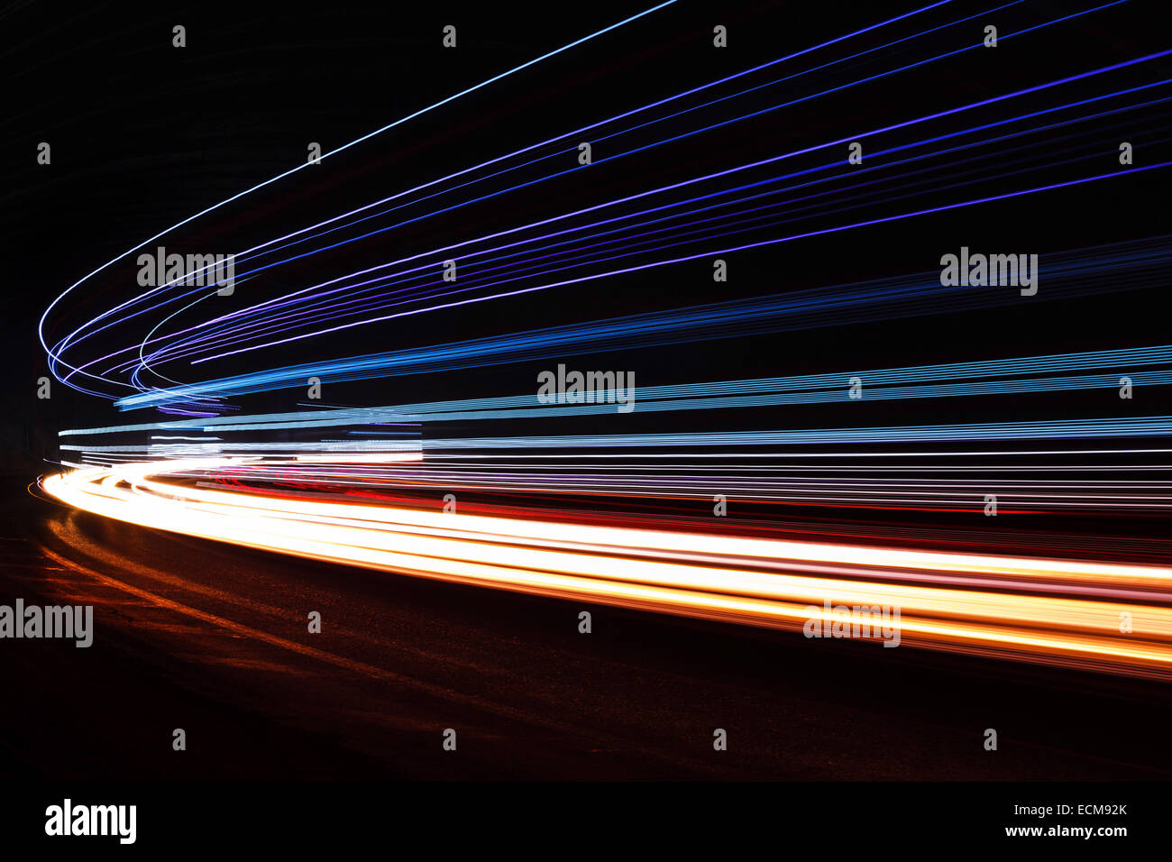 Light tralight trails in tunnel. Art image. Long exposure photo taken ...