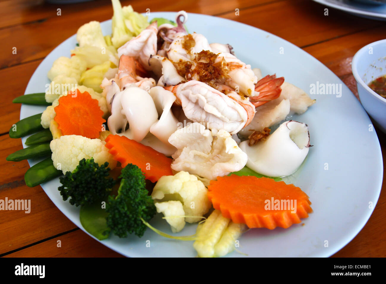 Mixed vegetables with seafood Stock Photo - Alamy