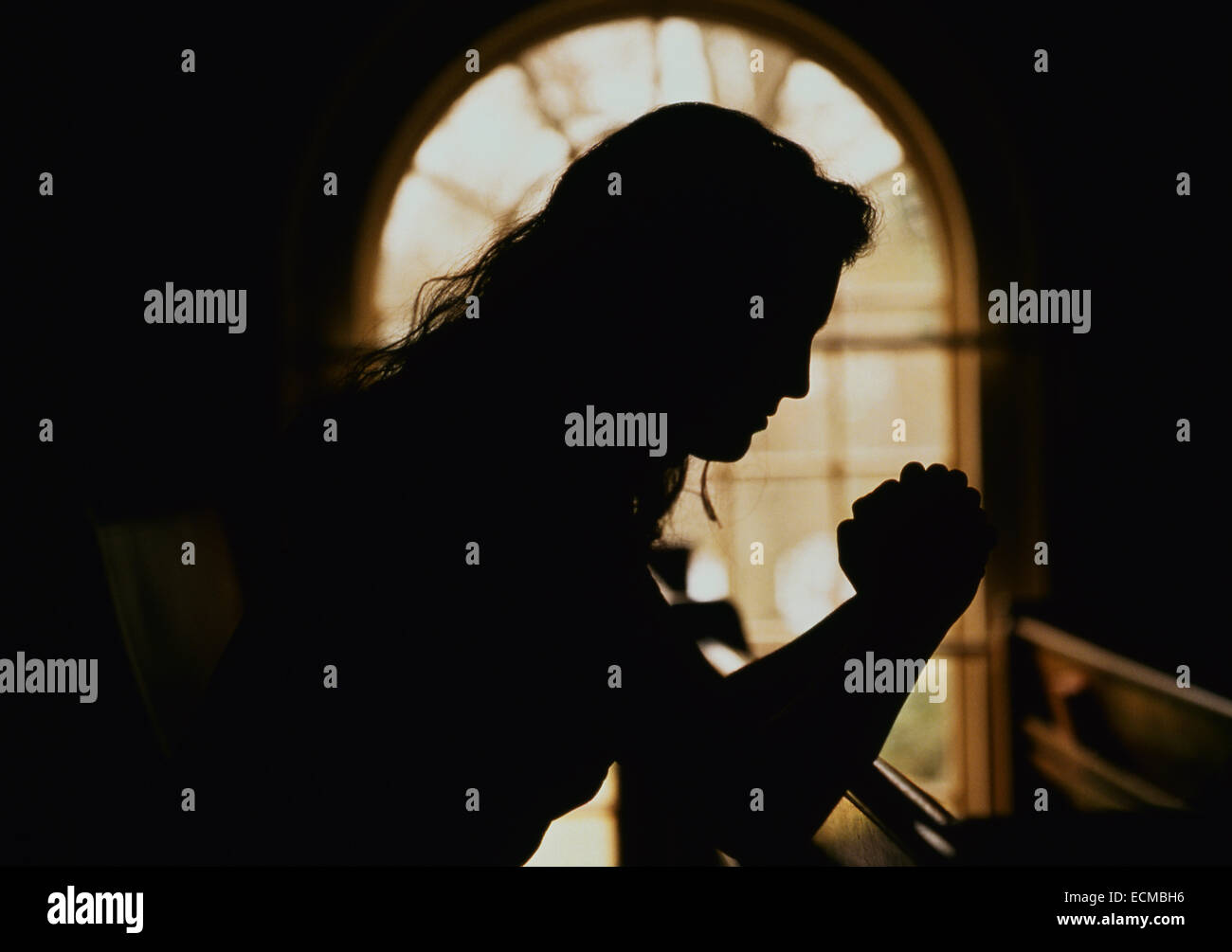 Silhouettes of worshipers in a Christian church Stock Photo - Alamy