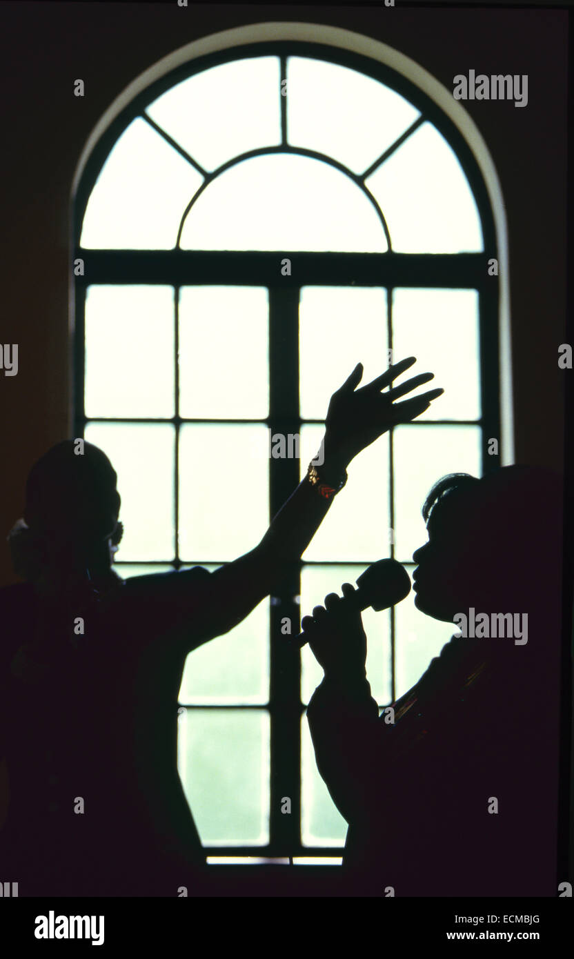 Silhouettes of worshipers in a Christian church Stock Photo - Alamy