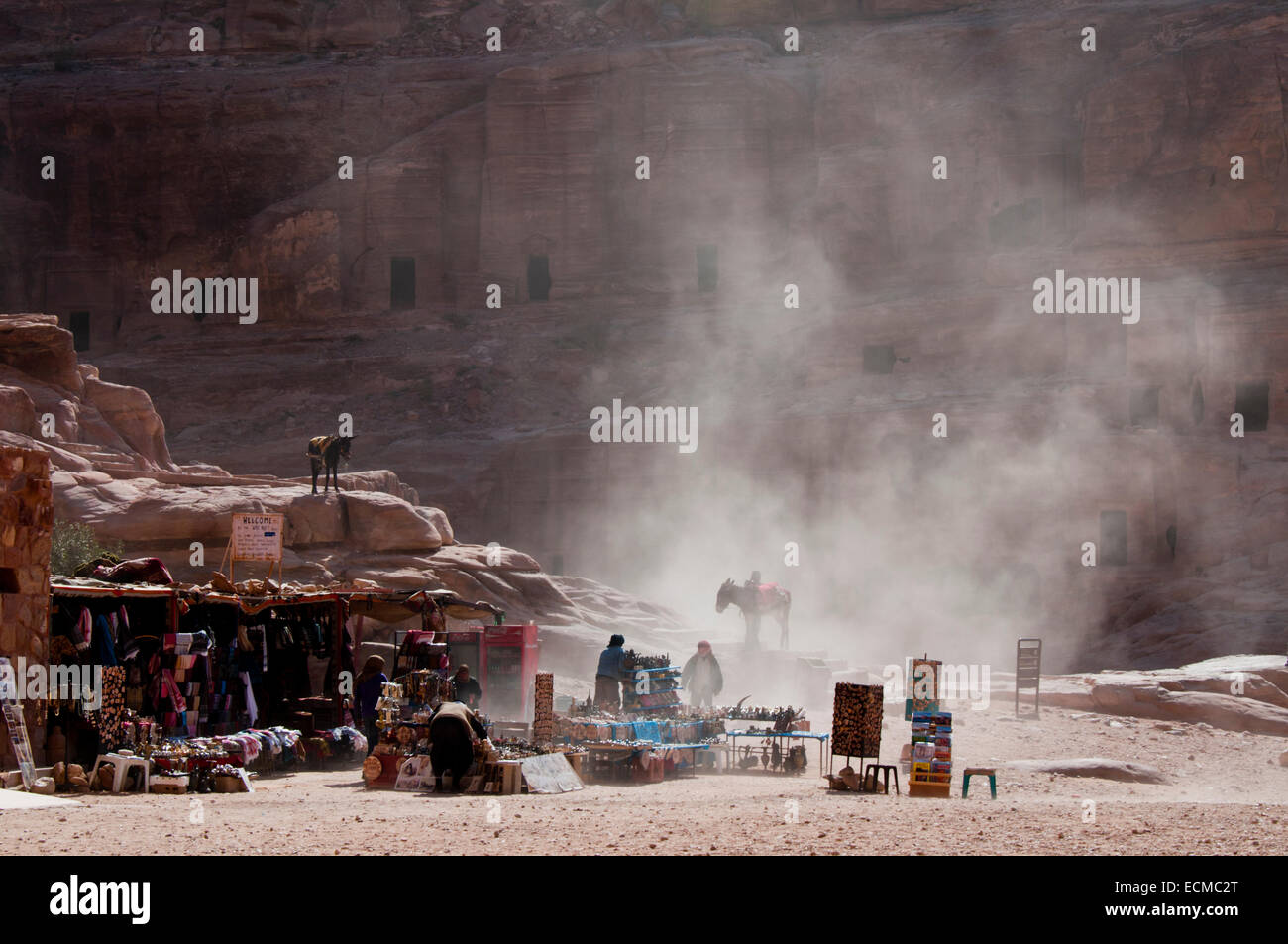Souvenir stalls in Petra, Jordan being hit by a dust devil - wind borne ...