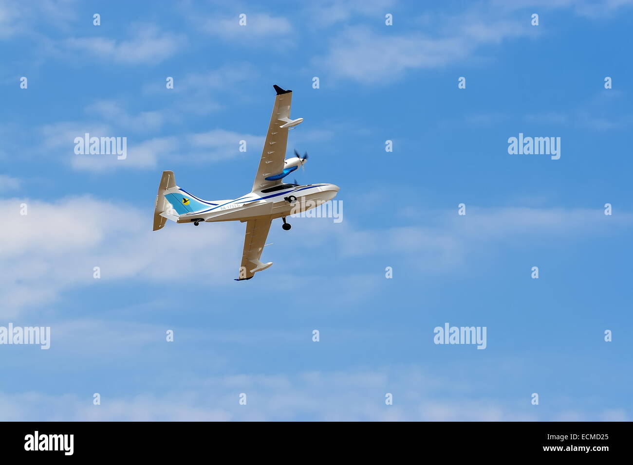 The plane is flying in the sky Stock Photo - Alamy