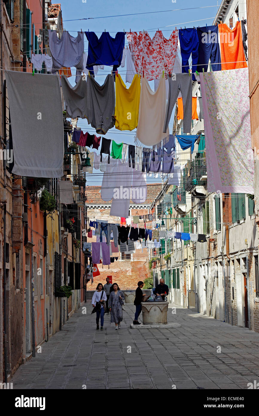 Laundry drying on laundry lines across the street, Castello, Venice ...