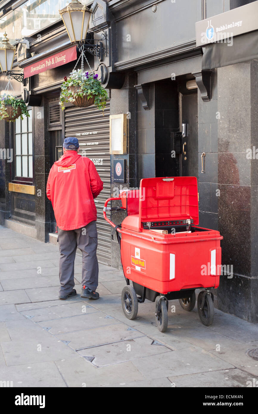 Back view postman uk hi-res stock photography and images - Alamy