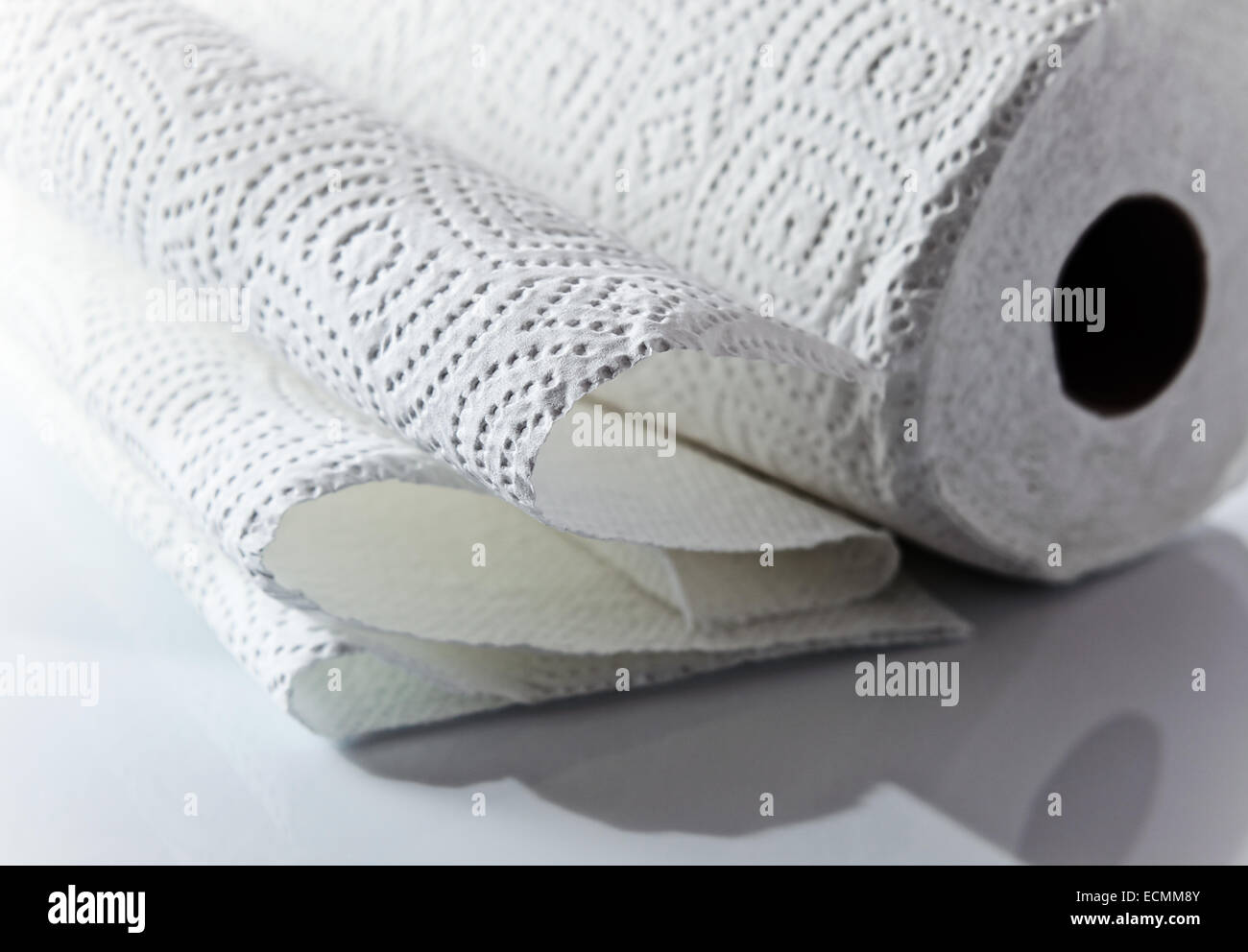 white paper towel on white reflective background Stock Photo - Alamy