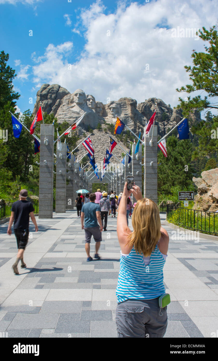Mount Rushmore South Dakota Keystone entrance with flags and tourists ...
