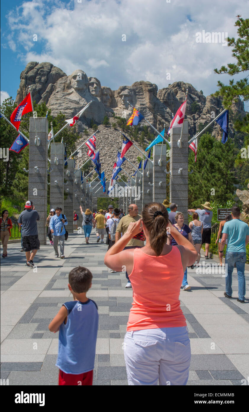 Mount Rushmore South Dakota Keystone entrance with flags and tourists ...